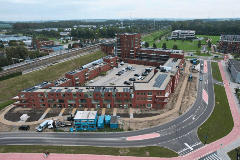 Bekijk hier luchtfoto's en de vorderingen van de bouw - Coloriet