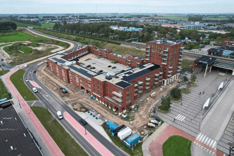 Bekijk hier luchtfoto's en de vorderingen van de bouw - Coloriet